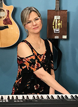 Tracy Jane Comer - Multi-Instrumentalist, Vocalist, Songwriter/Composer